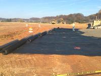 China Bitumen Coating Road Paving Material Fiberglass Geogrid with Mesh Size 12.7*12.7mm for sale