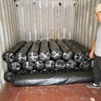 China Fiberglass Geogrid for Strength Roadbed Reinforcement White Asphalt Coated Geogrid for sale
