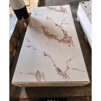 China Waterproof UV Coated PVC Marble Wall Panel 1.22x2.44m Golden Transfer Film Interior Decorative Board for sale