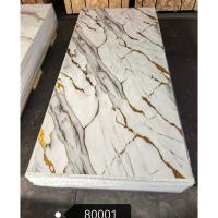 China Waterproof UV Coated PVC Marble Wall Panel 1.22x2.44m Golden Transfer Film Interior Decorative Board for sale