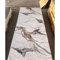 China Waterproof UV Coated PVC Marble Wall Panel 1.22x2.44m Golden Transfer Film Interior Decorative Board for sale