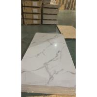China Waterproof UV Coated PVC Marble Wall Panel 1.22x2.44m Golden Transfer Film Interior Decorative Board for sale