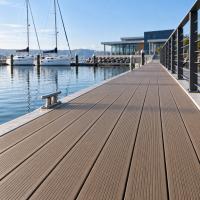 China Outdoor WPC Decking 140x25mm Round Hole Anti Slip Outdoor Deck Floor Panel for sale
