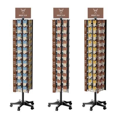 China Supermarket Rotating 88-Hooks Metal Grid Panel Car Coaster Display Stand Rack with Movable Wheels for sale