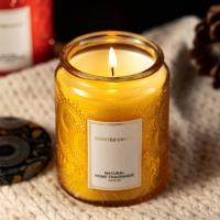 China Yellow / Red / White Soy Scented Candle Embossed Glass Jar Candles For Private Label OEM for sale
