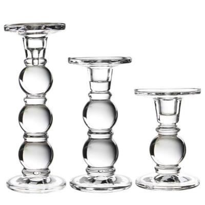 China Upmarket Quality Wholesale clear tall glass candelabra candlestick holder for party for sale