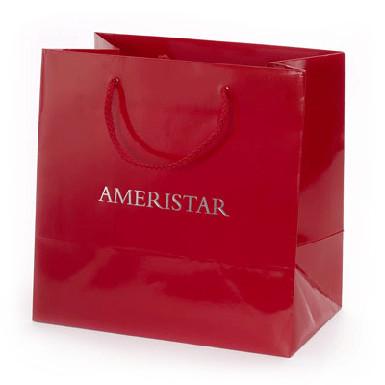 China Red Glossy Paper Gift Bag With Nylon Handle Silver Stamping for sale