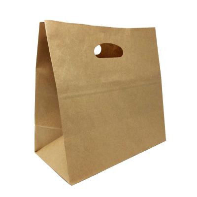 China CMYK Printed Custom Brown Kraft Paper Bag With Die Cutting Handle for sale