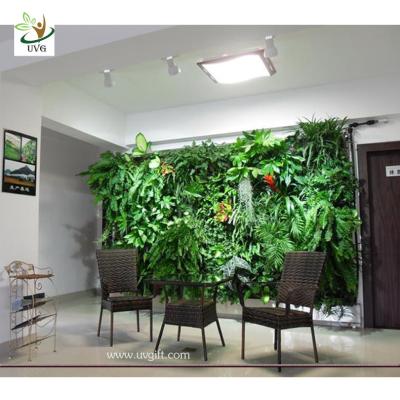 China Artificial Green Plastic Plants Fake Vertical Garden Living Wall Indoor Landscaping 50x50cm Panel for sale