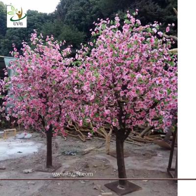 China Artificial Peach Blossom Tree Centerpiece UVG Pink Small Wedding Table Decoration CHR158 for sale