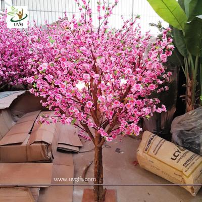 China Pink Artificial Peach Blossom Tree UVG Dongguang Manufacture for Emporium Decoration 1.5m for sale