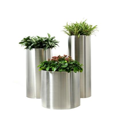 China Custom Stainless Steel Round Cylindrical Flower Pot 304 Grade Outdoor Garden Planter for sale