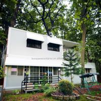 China Boxspace Wood Like Prefab House Kit Prefab Houses Modern Prefabricated Steel Container House Modular Flat Pack Container House for sale