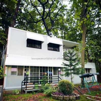 China Boxspace Wood Like Prefab House Kit Prefab Houses Modern Prefabricated Steel Container House Modular Flat Pack Container House for sale