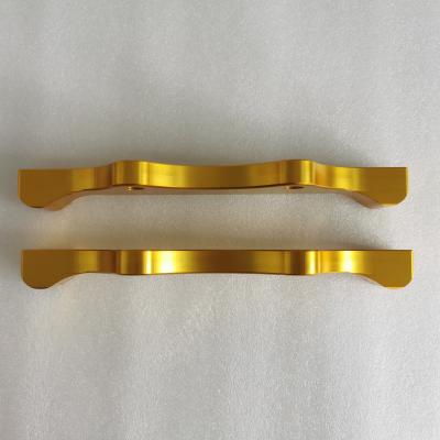 China Oxidation Gold Aluminum 7075 Brake Caliper Bracket Front Car Parts for sale