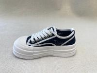 China Women black and white sneakers with breathable mesh and mid top for sale
