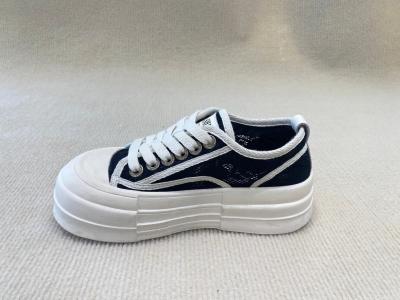 China Women black and white sneakers with breathable mesh and mid top for sale