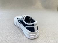 China Women black and white sneakers with breathable mesh and mid top for sale