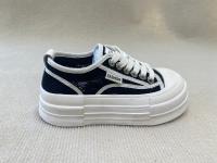 China Women black and white sneakers with breathable mesh and mid top for sale