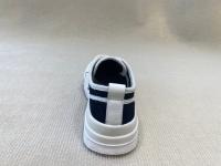 China Women black and white sneakers with breathable mesh and mid top for sale