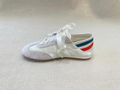 China Women comfort and flat sneakers with color bar and lace up running shoes for sale