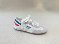China Women comfort and flat sneakers with color bar and lace up running shoes for sale