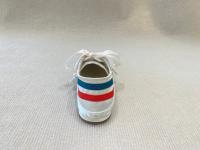 China Women comfort and flat sneakers with color bar and lace up running shoes for sale
