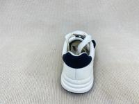 China Fashion Microfiber White Platform Sneakers Women With Flat Heel And Creature Pattern for sale