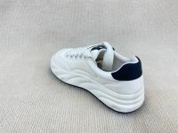 China Fashion Microfiber White Platform Sneakers Women With Flat Heel And Creature Pattern for sale