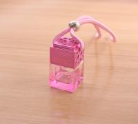 China Customized Color 6ml Car Perfume Glass Bottle With Colorful Lid And String for sale
