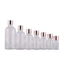 China 5ml 10ml 15ml 30ml Glass Essential Oil Bottle With Aluminum Cap / Plastic Cap for sale