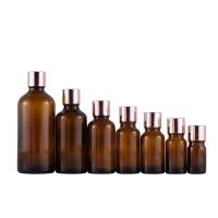 China 5ml 10ml 15ml 30ml Glass Essential Oil Bottle With Aluminum Cap / Plastic Cap for sale