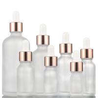 China Frosted Transparent Essential Oil Glass Bottles 5ml-100ml With Rose Gold Dropper for sale