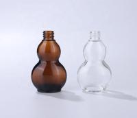China Empty Amber Glass Bottle Double Gourd Flat Shaped Glass Dropper Serum Bottle 30ml for sale