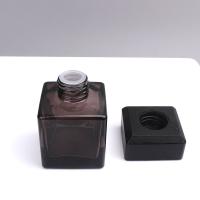 China Luxury Empty 100ml Gray Black Reed Glass Diffuser Bottle With Wooden Cap for sale