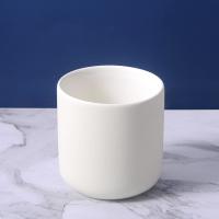 China Cylinder Luxury Candle Jars Matte Empty Geometric Ceramic Candle Jars With Lids for sale