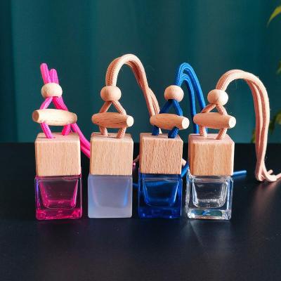 China 8ml Square Glass Car Perfume Bottle with Wooden Lid for sale