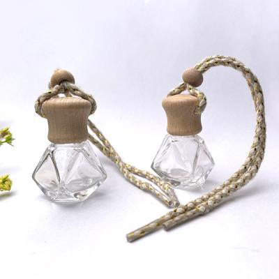 China 7ml Glass Car Perfume Bottle with Wooden Lid for Essential Oils for sale