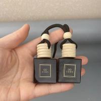 China 8ml Black Glass Car Perfume Bottle with Wooden Lid for sale