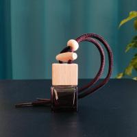 China 8ml Colored Glass Car Perfume Bottle with Wooden Lid for sale