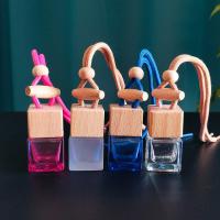 China 8ml Colored Glass Car Perfume Bottle with Wooden Lid for sale