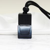 China 8ml Black Aroma Diffuser Bottle Diffuser Glass Hanging Perfume Bottle With Black Wood Lids for sale