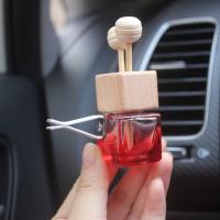 China 8ml Rattan Wood Ball Car Perfume Bottle with Wooden Lid for sale