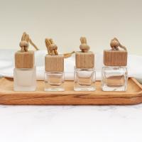 China 8ml 10ml Glass Car Air Freshener Bottle with Wooden Lid for sale