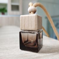 China 7ml New Color Hanging Fragrance Diffuser Car Pendant Perfume Square Wooden Cap With Coffee Brown Glass Bottle for sale