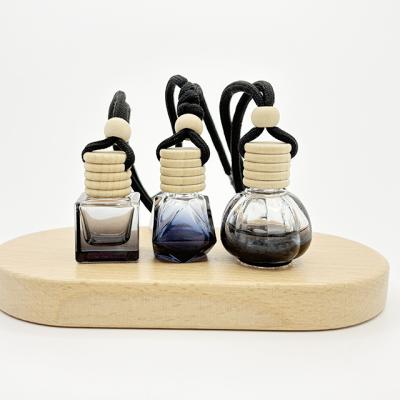 China Square Triangle Black Glass Screw Sealed Car Perfume Bottle with Rubber Stopper Hanging Diffuser for sale