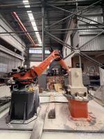 China 6-Axis CNC Robot Stone Cutting Machine with Interpolated Control and BT40 Spindle for Large-Scale Carving up to 3100mm for sale