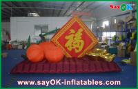 China Printing Logo Large Orange Inflatable Yard Decorations For New Year for sale