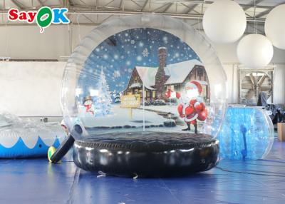 China Inflatable Snow Globe 3m Human Size Transparent Photo Booth with Blowing Snow for Christmas Events for sale