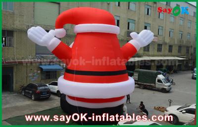 China Custom Inflatable Santa Claus 210D Oxford Christmas Decoration with Blower for Outdoor Events for sale